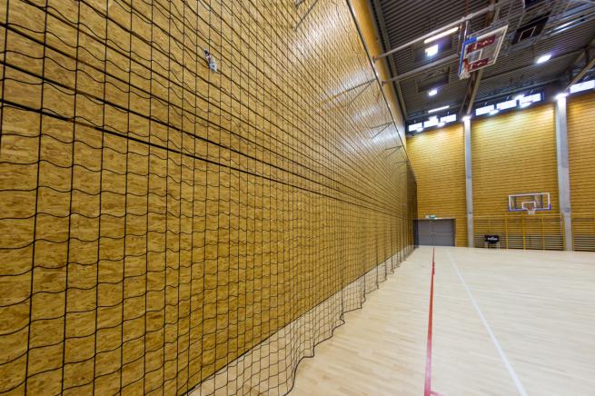 BALL CATCHING NETS BEHIND HANDBALL GOALS